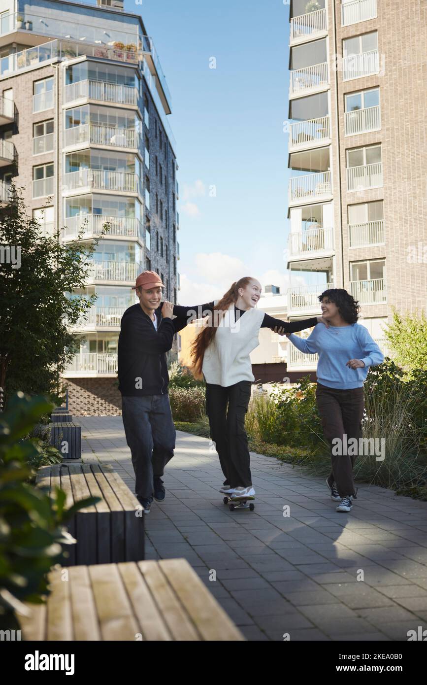 Friends hanging around together Stock Photo - Alamy