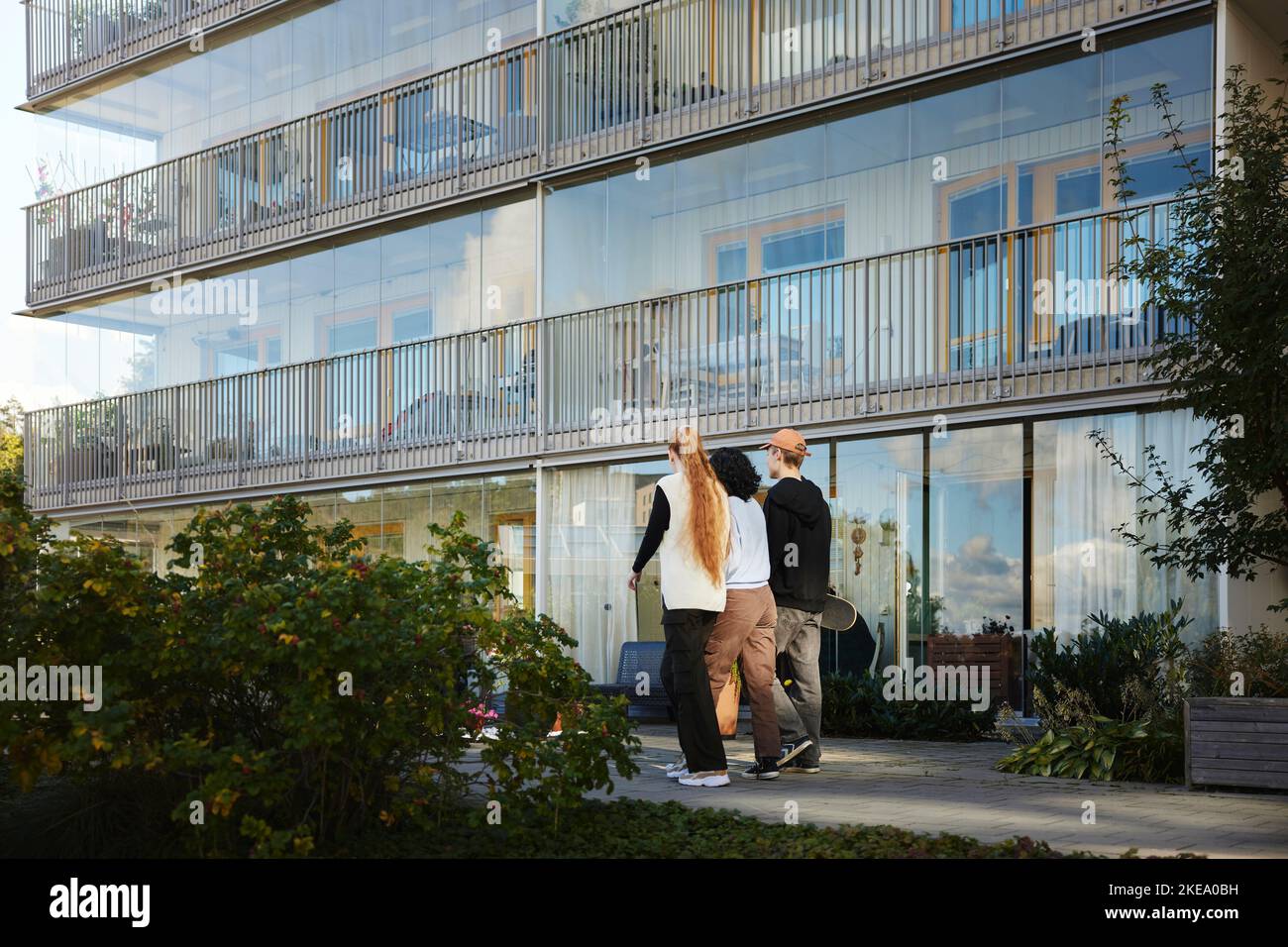 Teen walking into house hi-res stock photography and images - Alamy