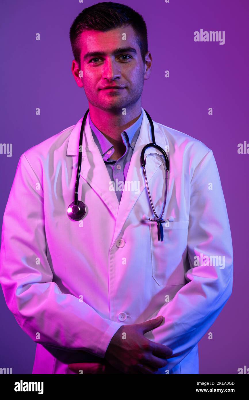 Coronavirus covid-19 danger alert Portrait of hero in white coat ...