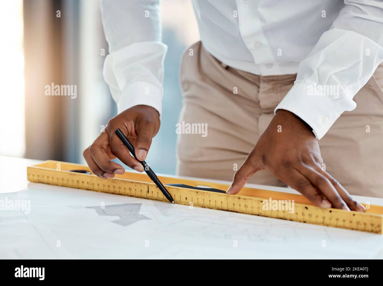 Measure, blueprint and architecture hands drawing lines for project development construction ...