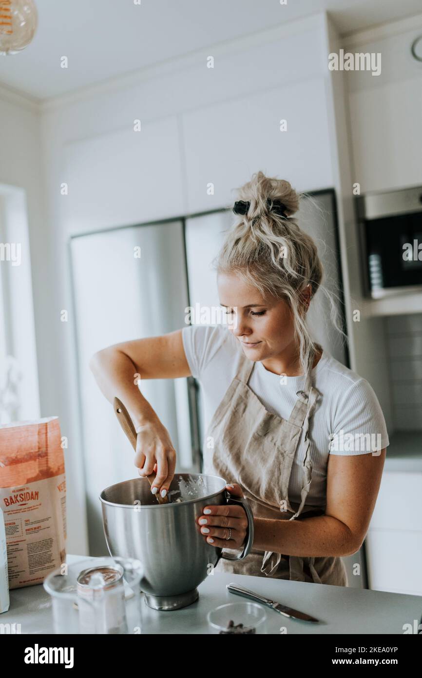 Long haired woman cooking hi-res stock photography and images - Alamy