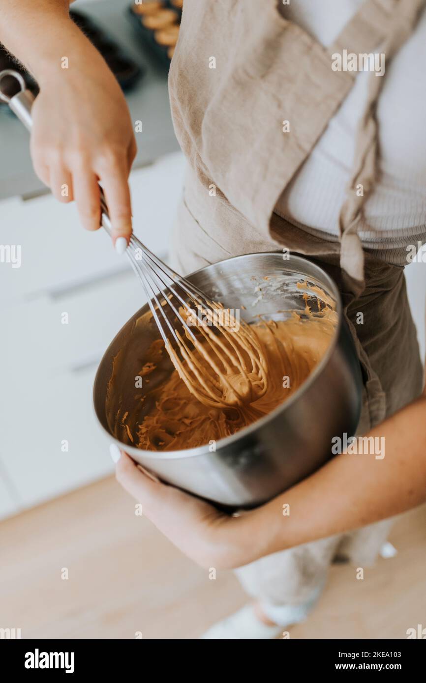 Woman hand whisk mixing hi-res stock photography and images - Alamy
