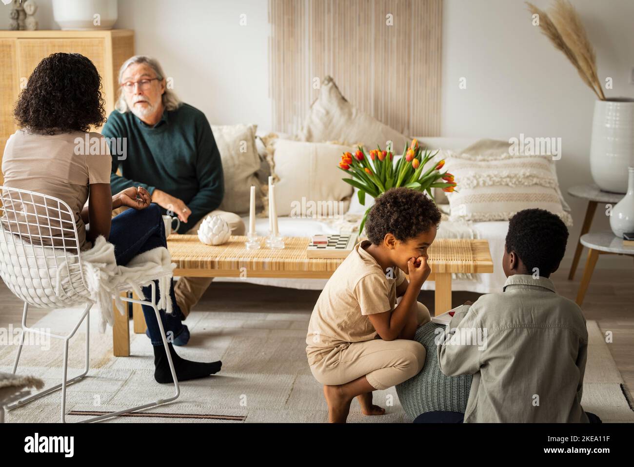 Kid boys talking hi-res stock photography and images - Alamy