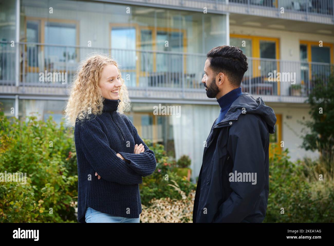 Young people talking together Stock Photo - Alamy