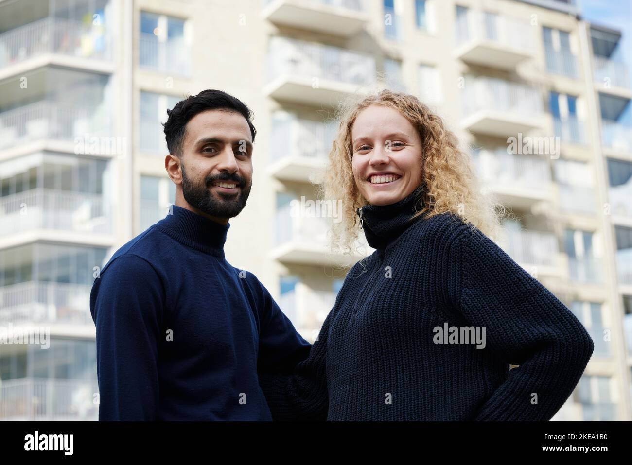 Young people looking at camera Stock Photo - Alamy