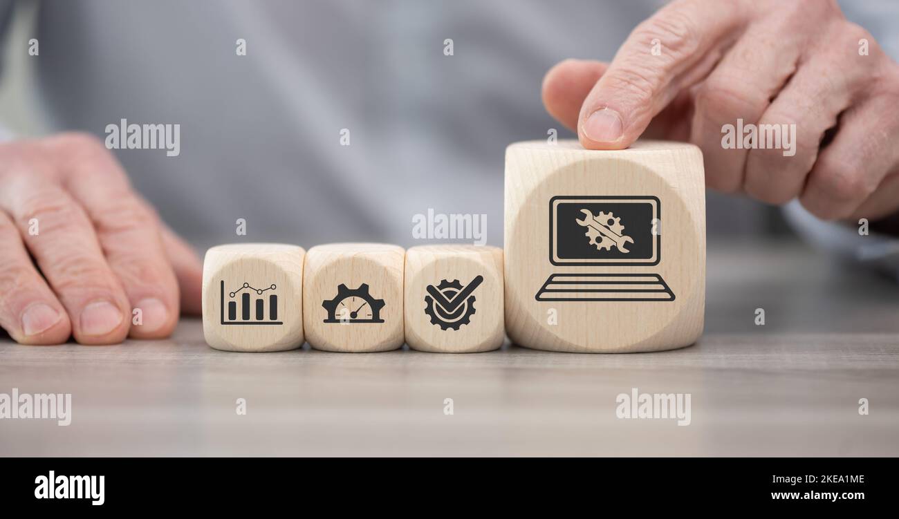 Wooden blocks with symbol of system maintenance concept Stock Photo - Alamy