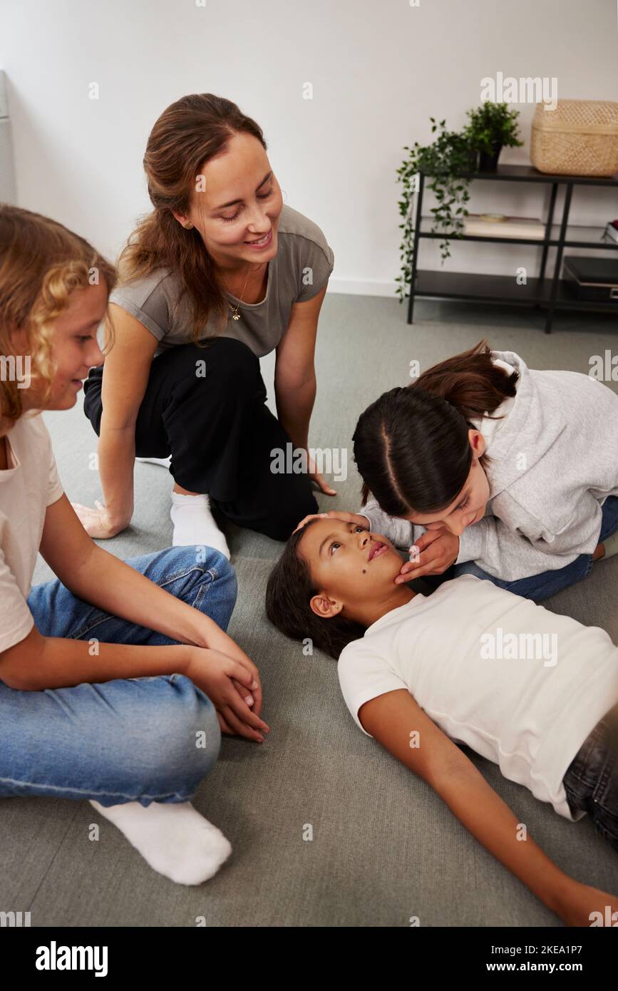 Teacher giving first aid training Stock Photo - Alamy