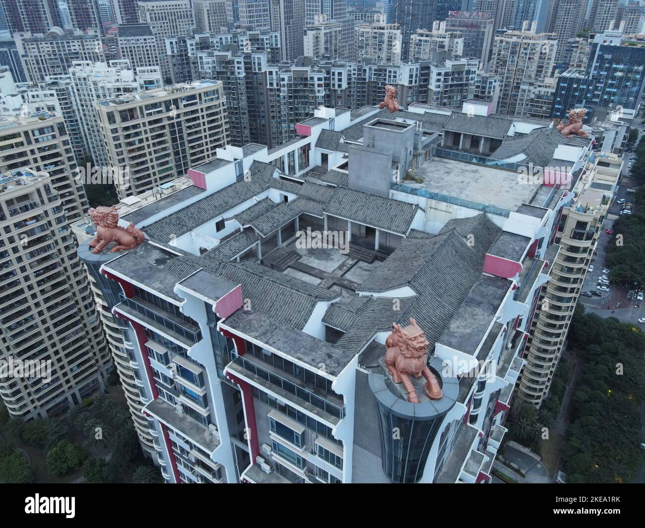 Aerial photos show two quadrangle courtyards with four Kylin statues on ...