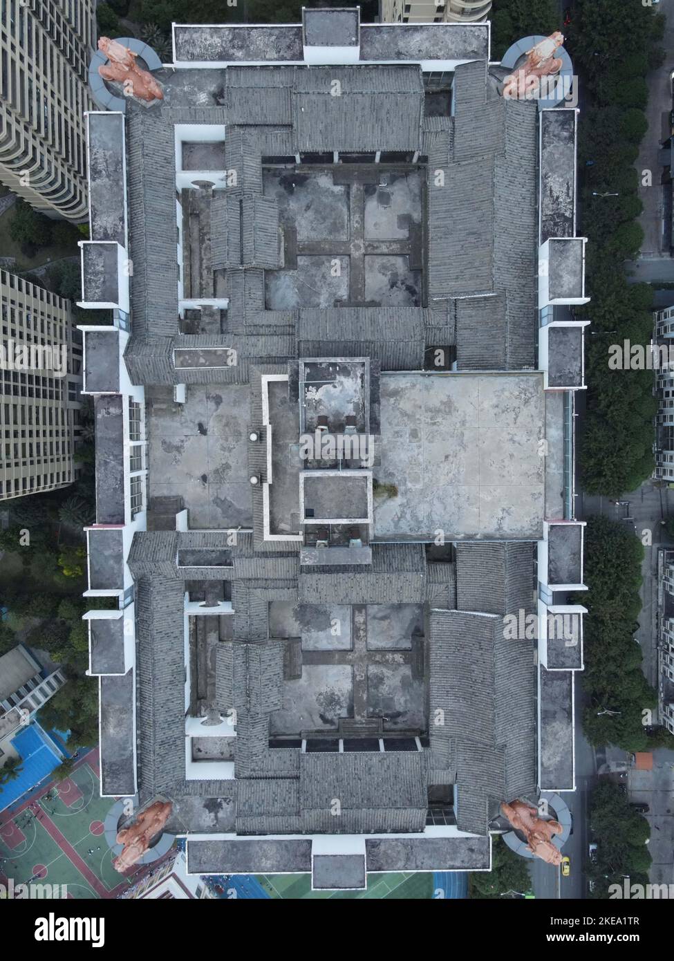 Aerial photos show two quadrangle courtyards with four Kylin statues on ...
