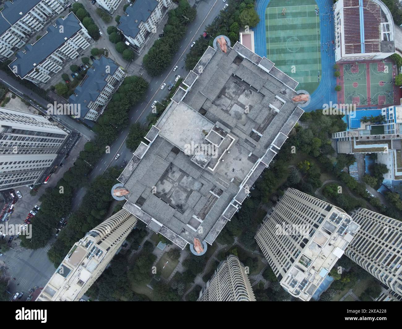 Aerial photos show two quadrangle courtyards with four Kylin statues on ...