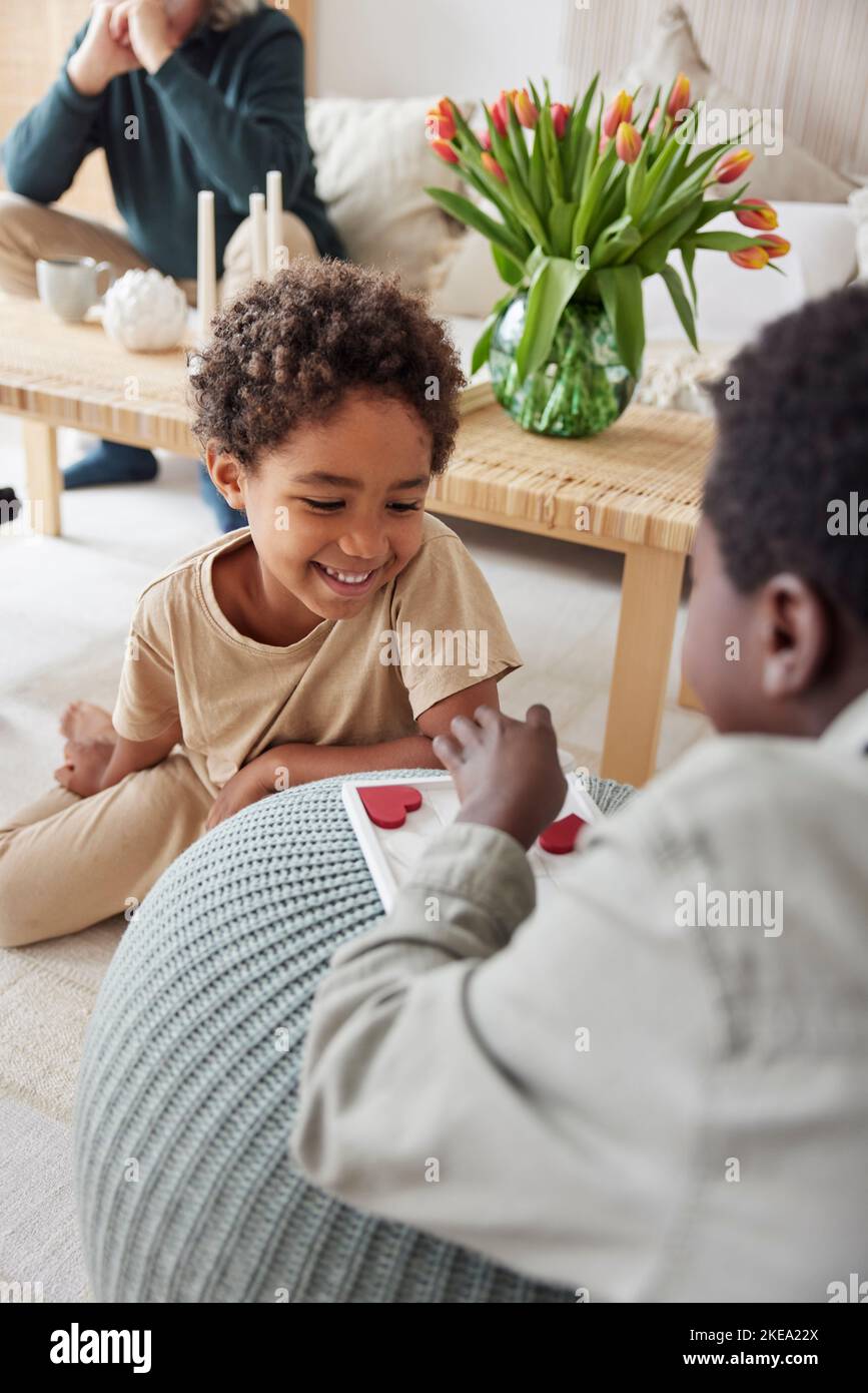 Brothers playing game at home Stock Photo - Alamy