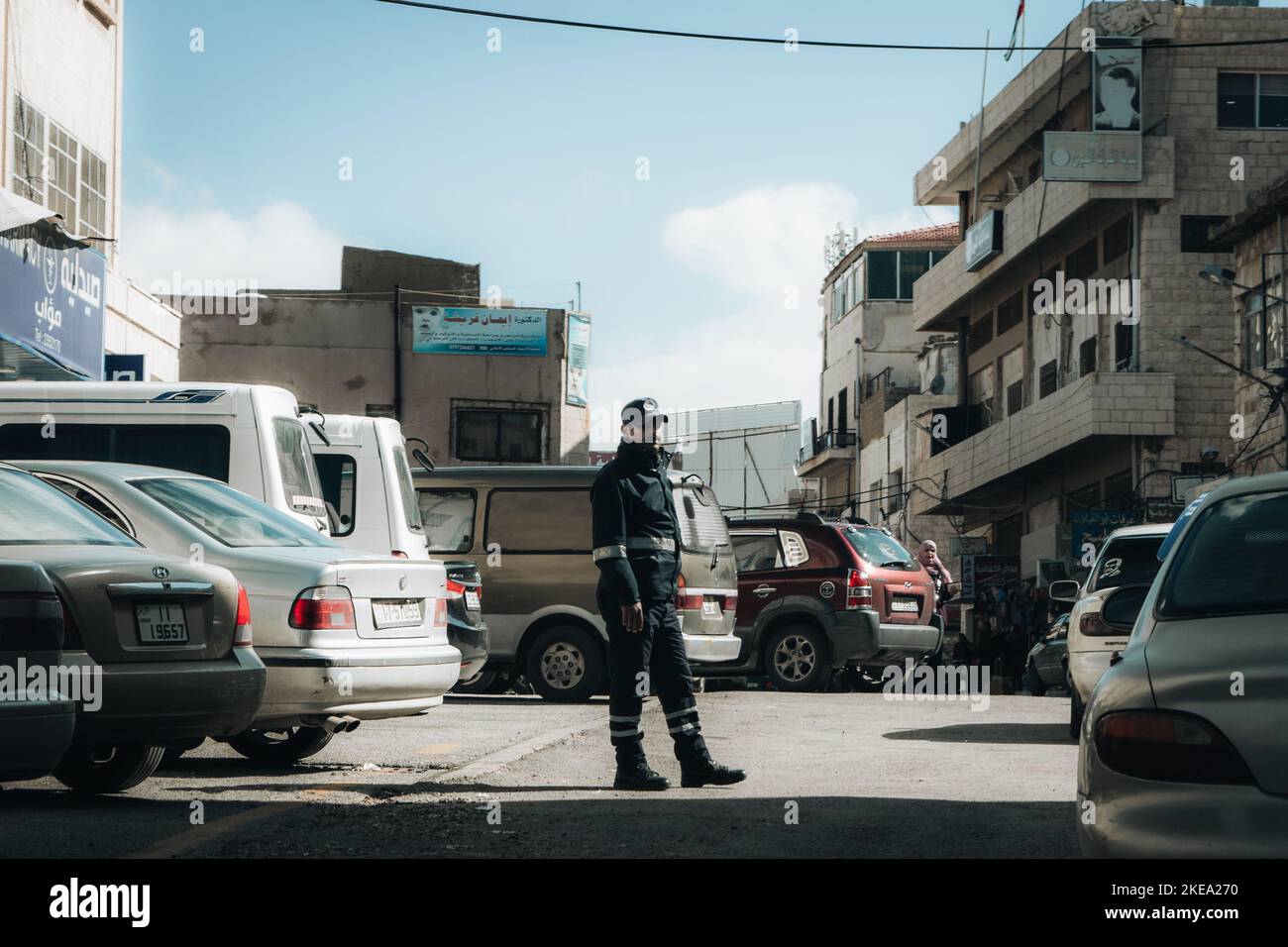 Traffic police guiding traffic in Kerak Stock Photo - Alamy