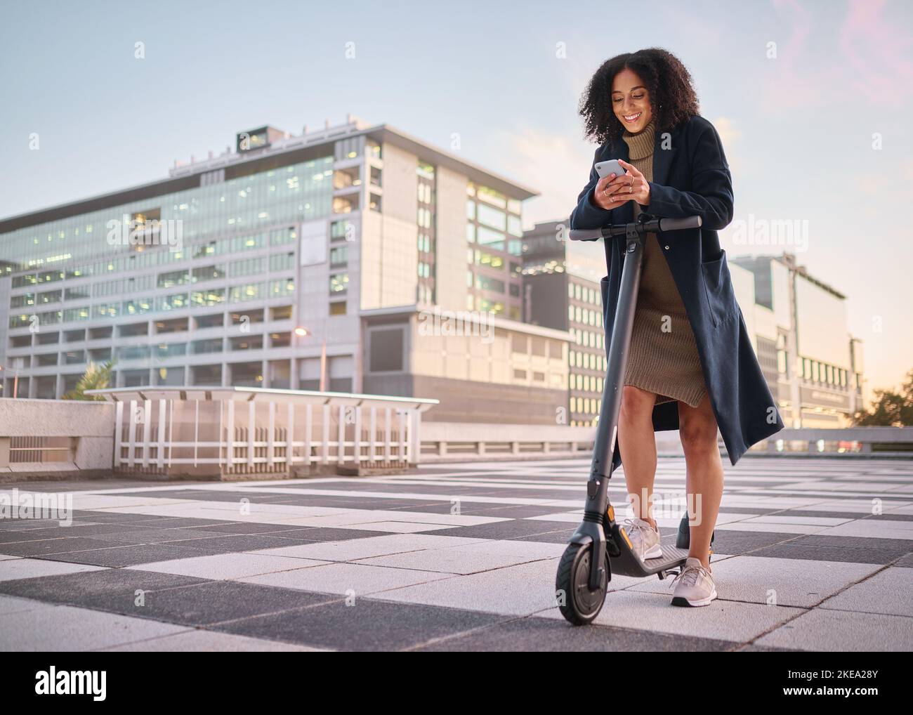 Black woman, electric scooter and smartphone in city, for communication ...