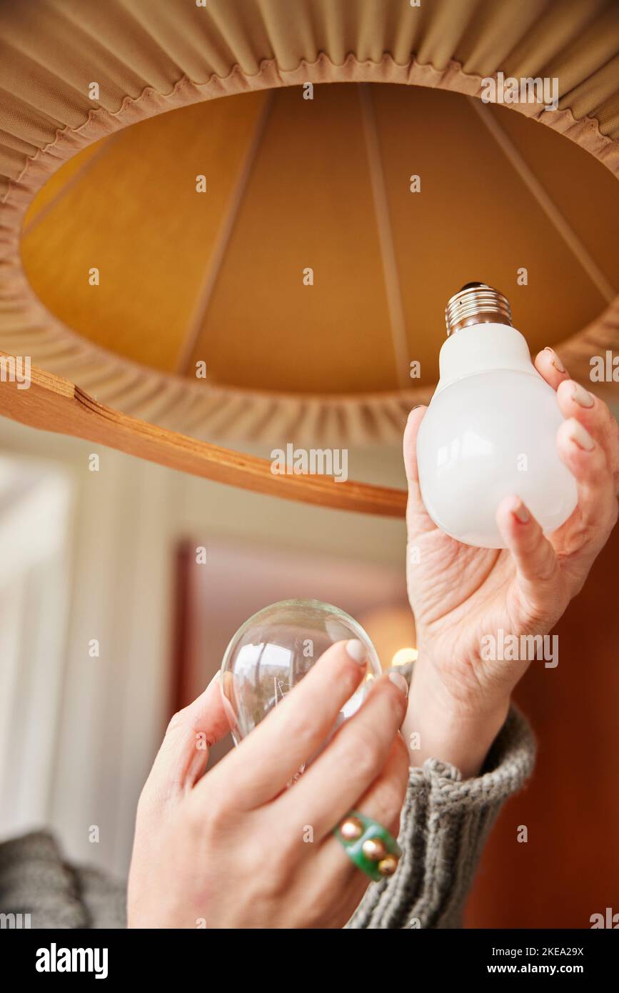 Changing lightbulb hi-res stock photography and images - Alamy