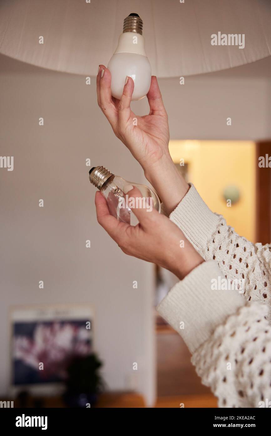Changing lightbulb hi-res stock photography and images - Alamy