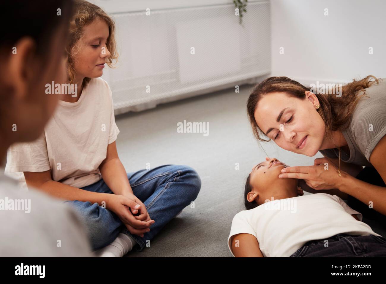 Teacher giving first aid training Stock Photo - Alamy