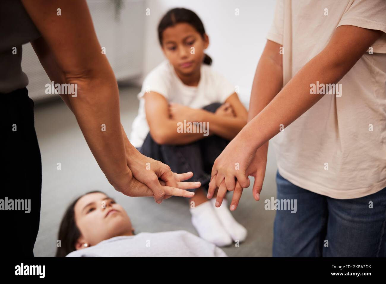 Teacher giving first aid training Stock Photo - Alamy