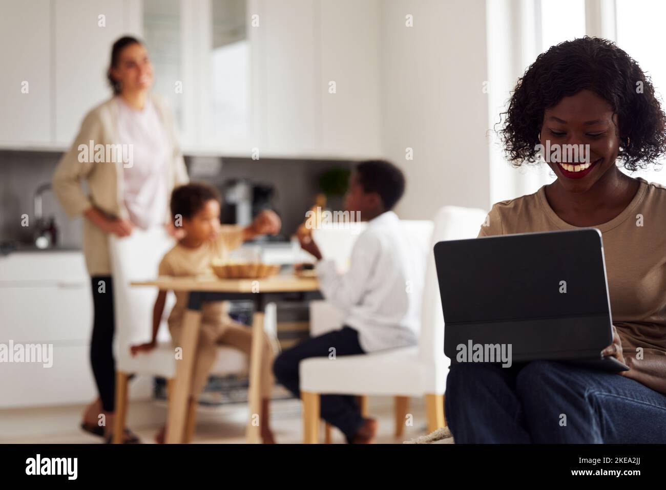 Family working and doing chores at home Stock Photo - Alamy