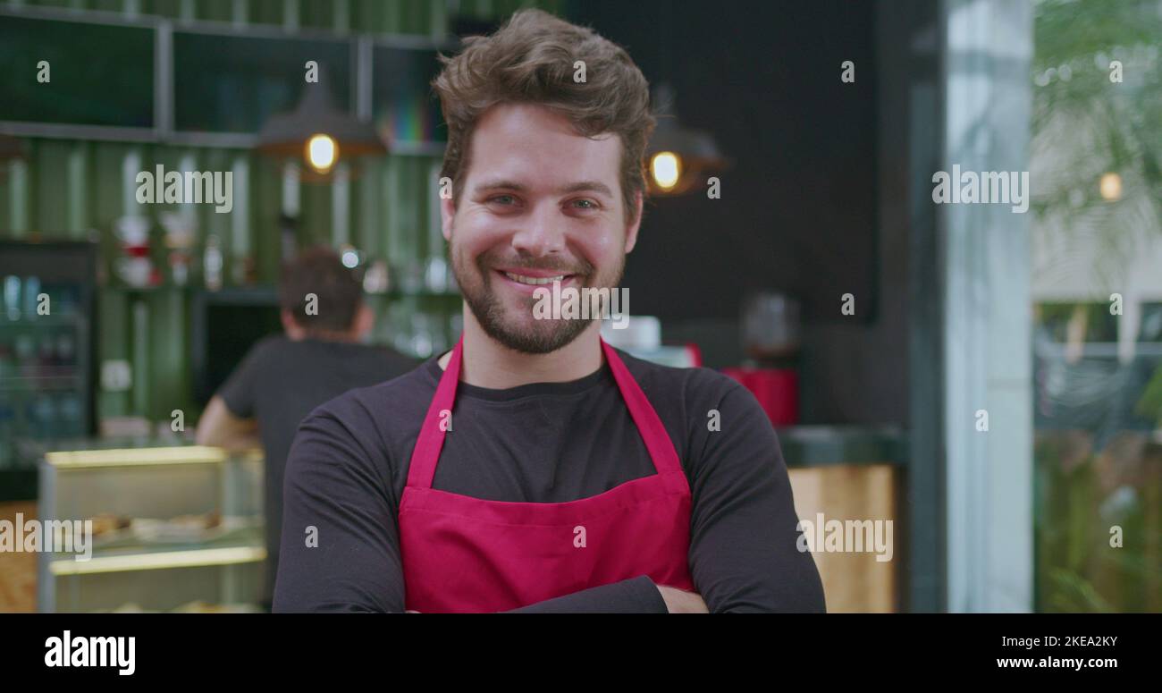 Portrait of a happy male barista of small business coffee shop Stock ...