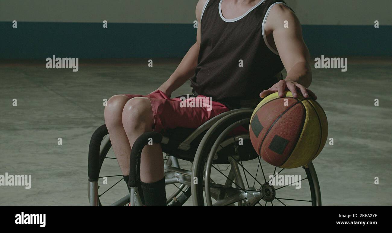 One paraplegic disabled athlete on wheelchair playing ball Stock Photo ...