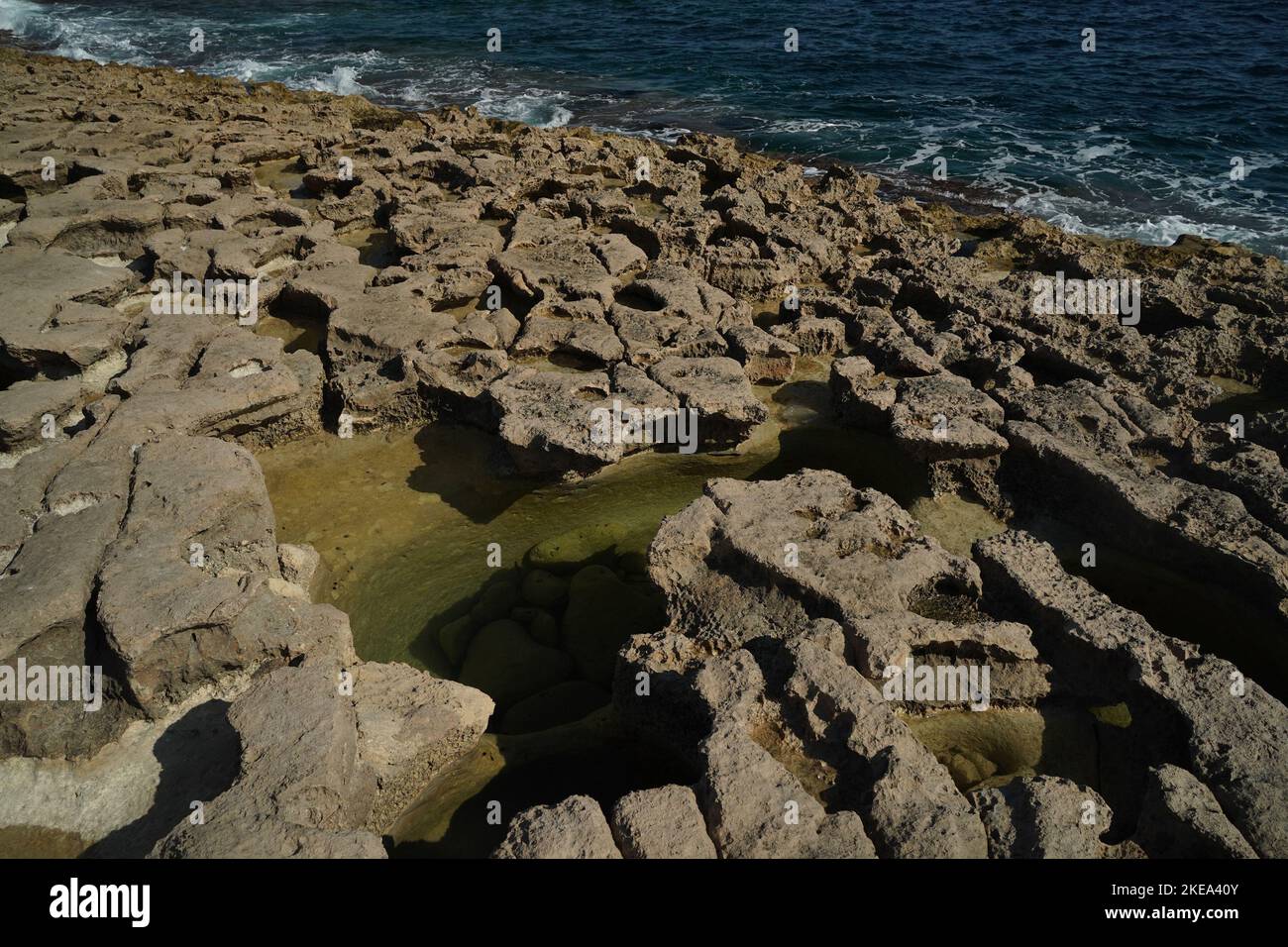saint peter pools Malta rock formation hole on rocks view Stock Photo ...