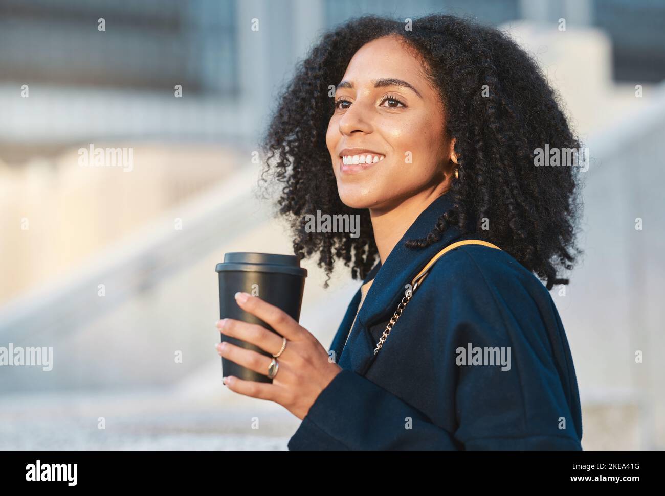 Coffee, thinking and city with a business black woman walking to walk ...