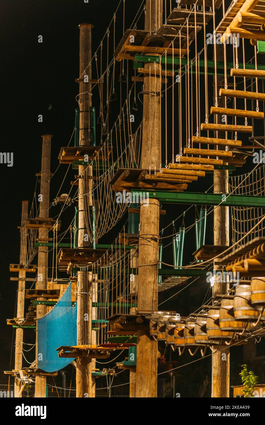 Fun and hard adventure park captured in the nighttime Stock Photo - Alamy