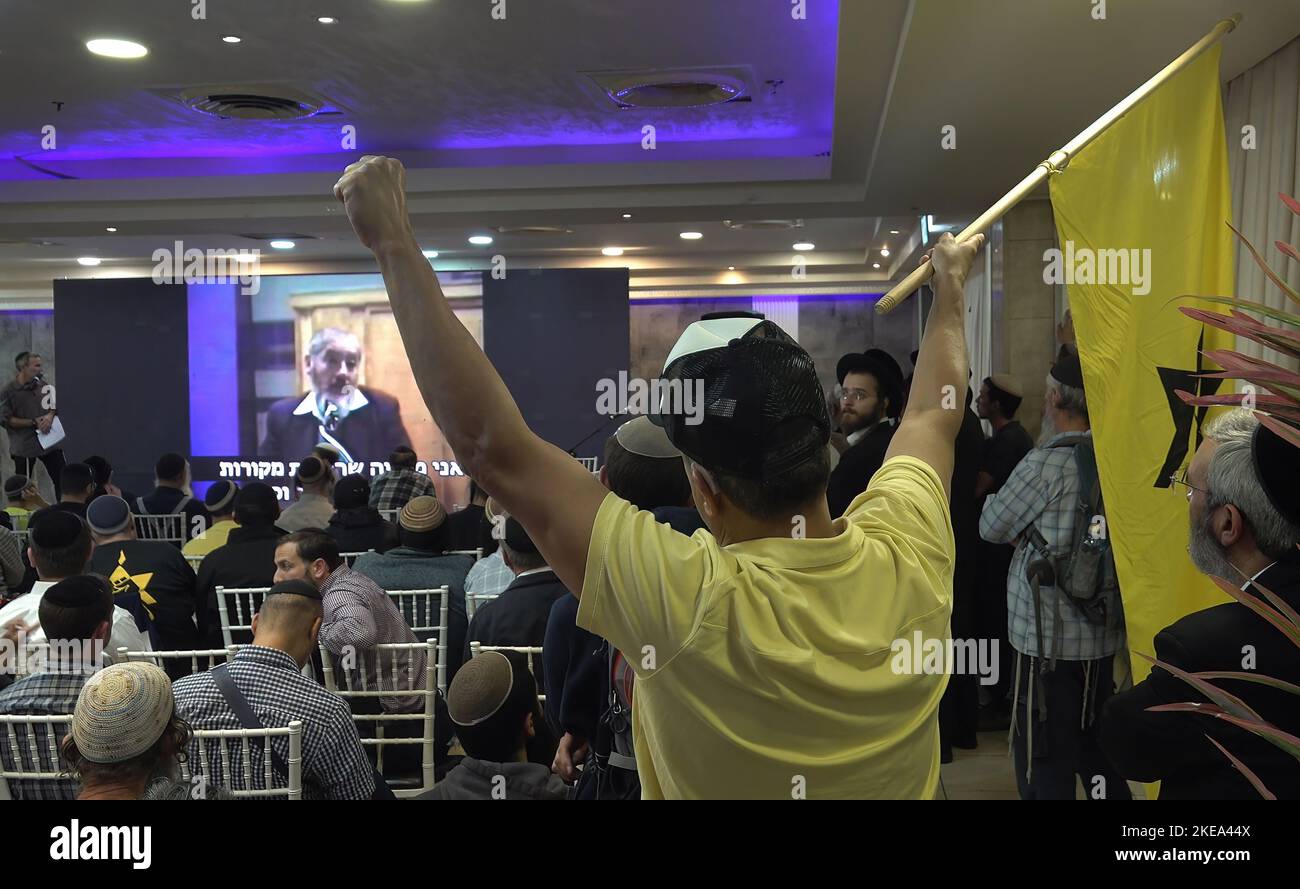 JERUSALEM, ISRAEL - NOVEMBER 10: A far right-wing activist holds up the ...