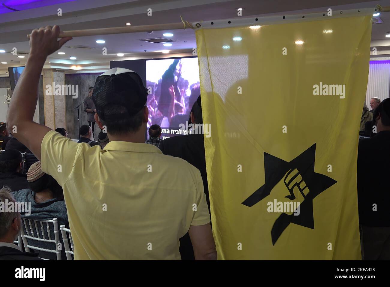 JERUSALEM, ISRAEL - NOVEMBER 10: A far right-wing activist holds up the ...