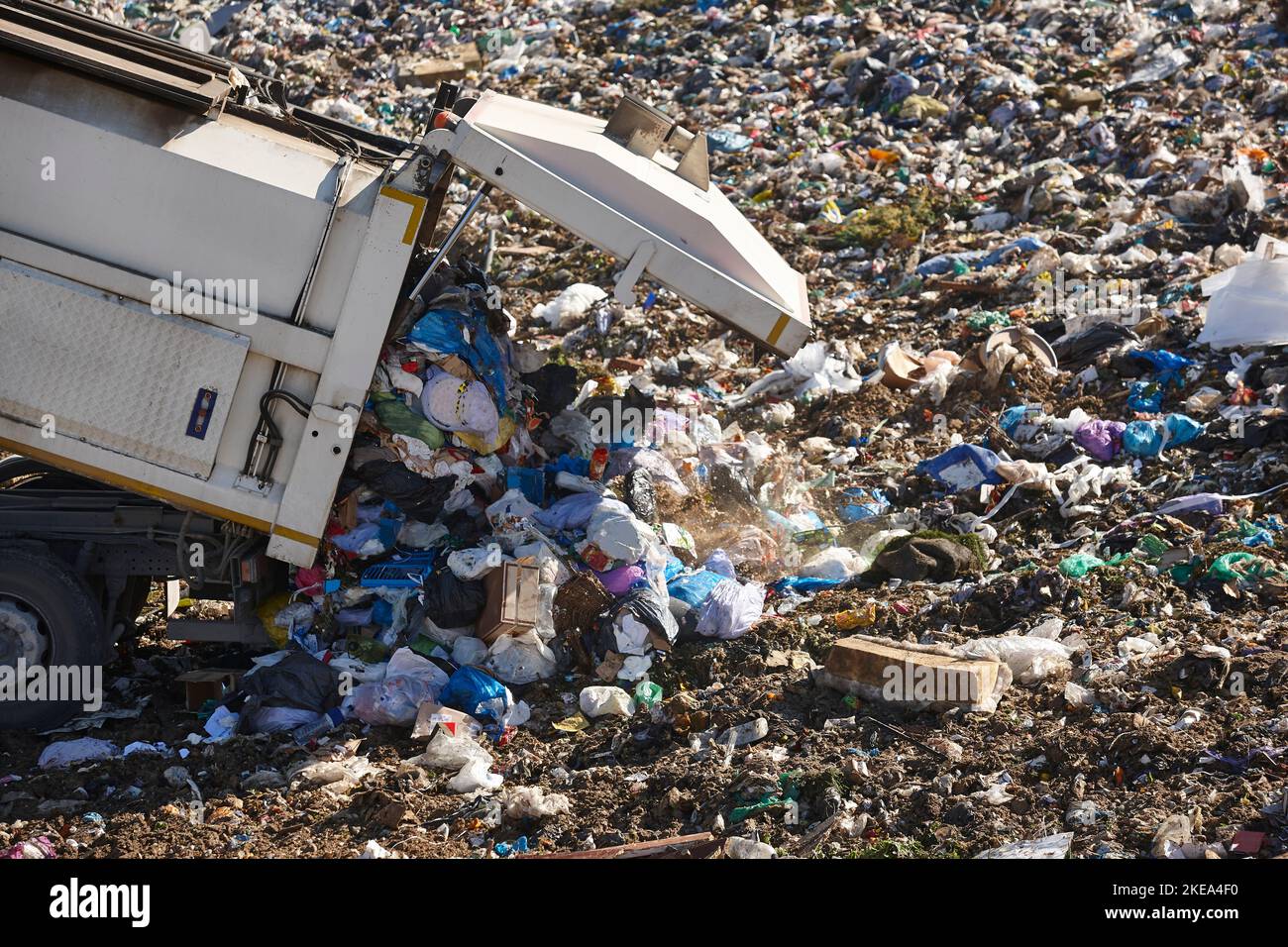 Truck unloading garbage on an open air dump. Waste recycling Stock ...