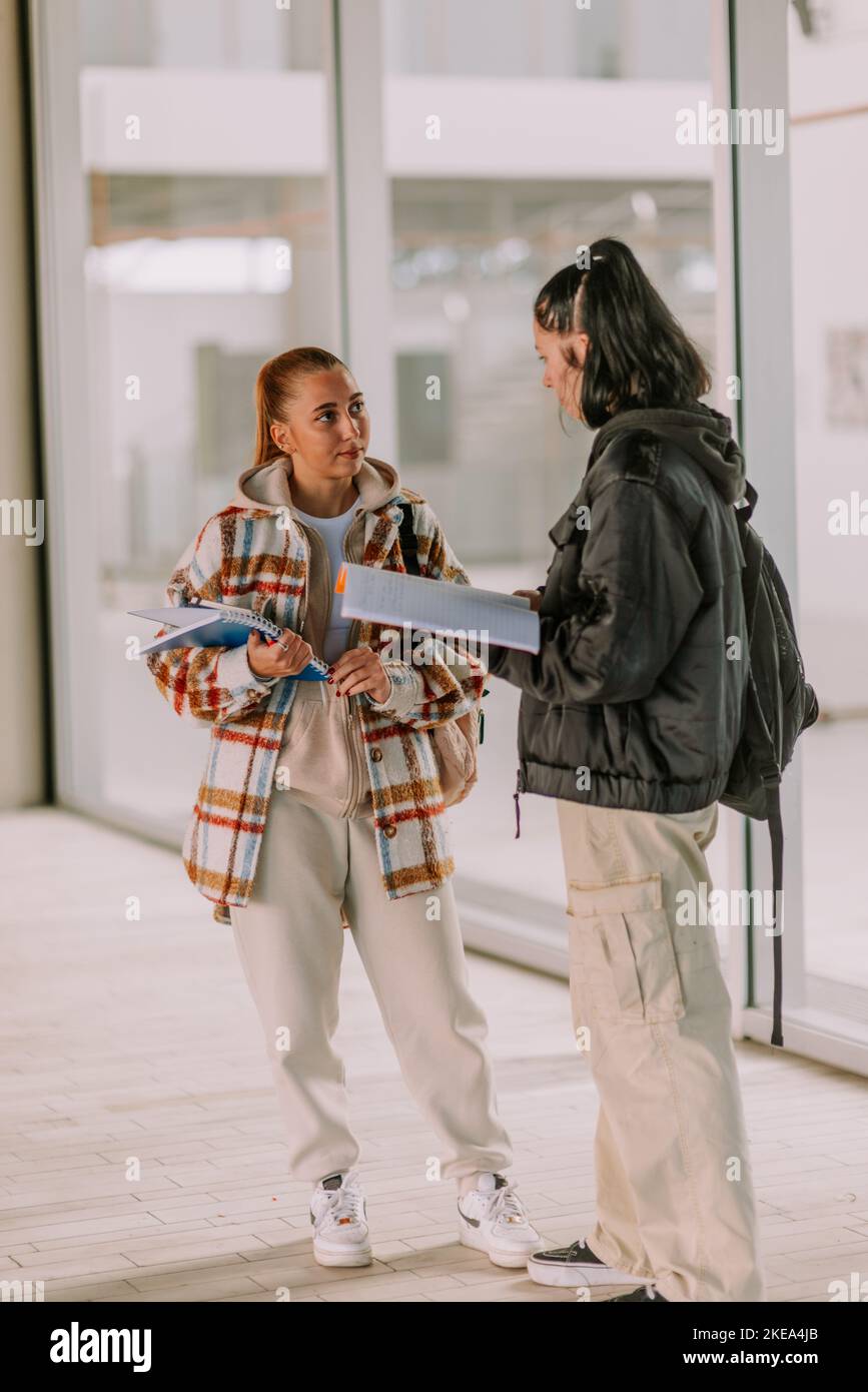 Two friends talking school serious hi-res stock photography and images ...