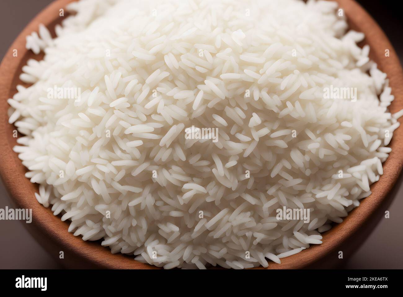 a cup of cooked rice, rice is a staple food high in carbohydrates Stock ...