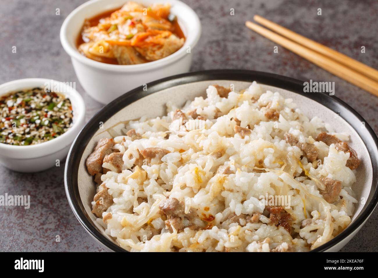 Kongnamul Bap is a classic Korean rice cooked with soybean sprouts with ...