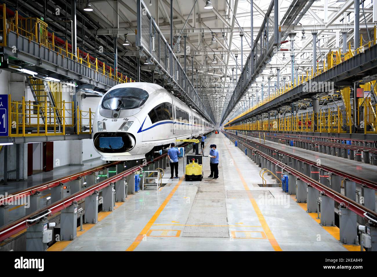 Workers are overhauling the EMU(Electrical Multiple Unit) in accordance ...
