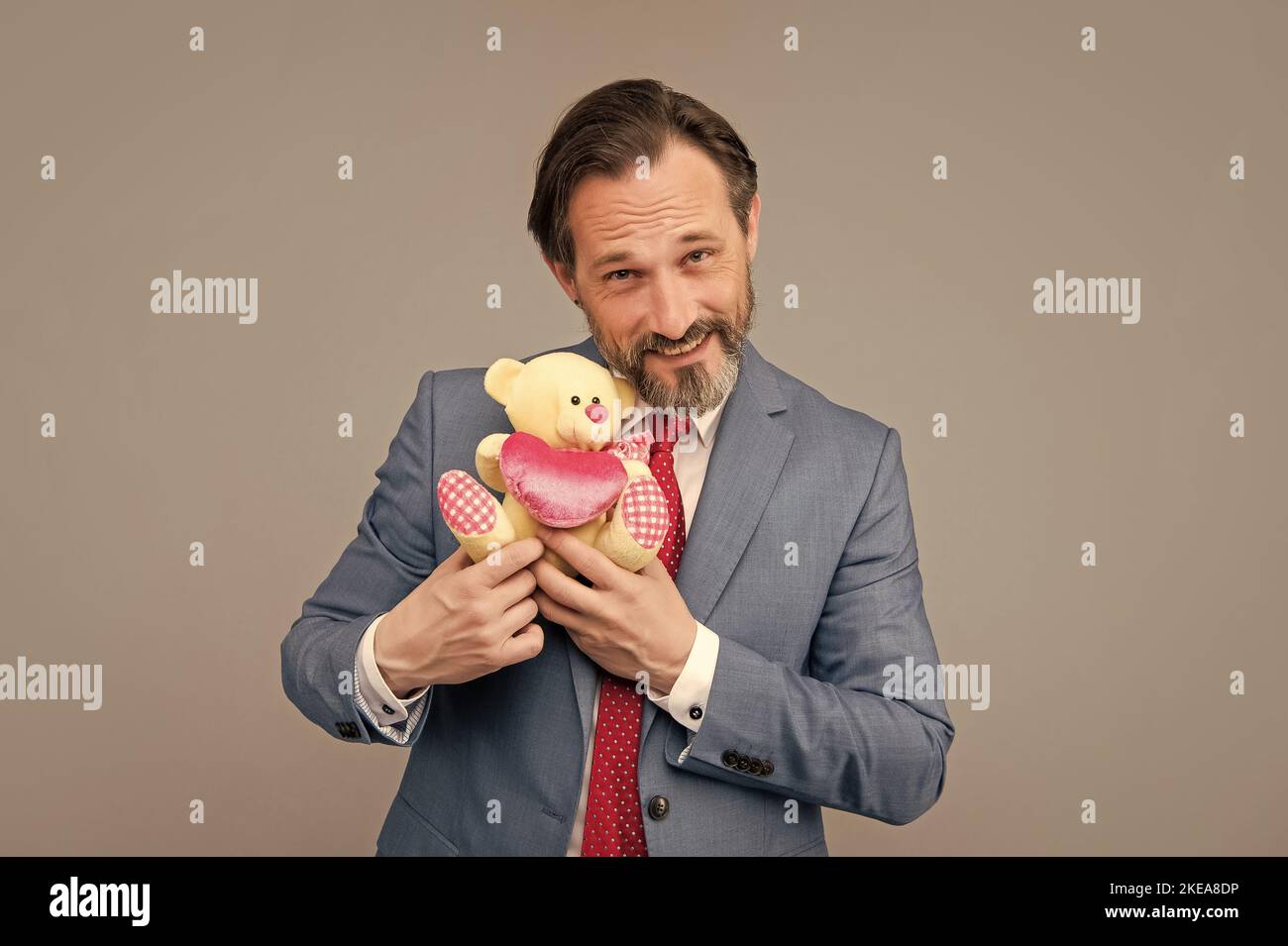 businessman show toy and heart. valentines day. be my valentine ...