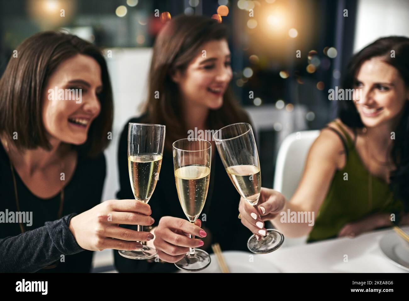 Group of people toasting night hi-res stock photography and images - Alamy