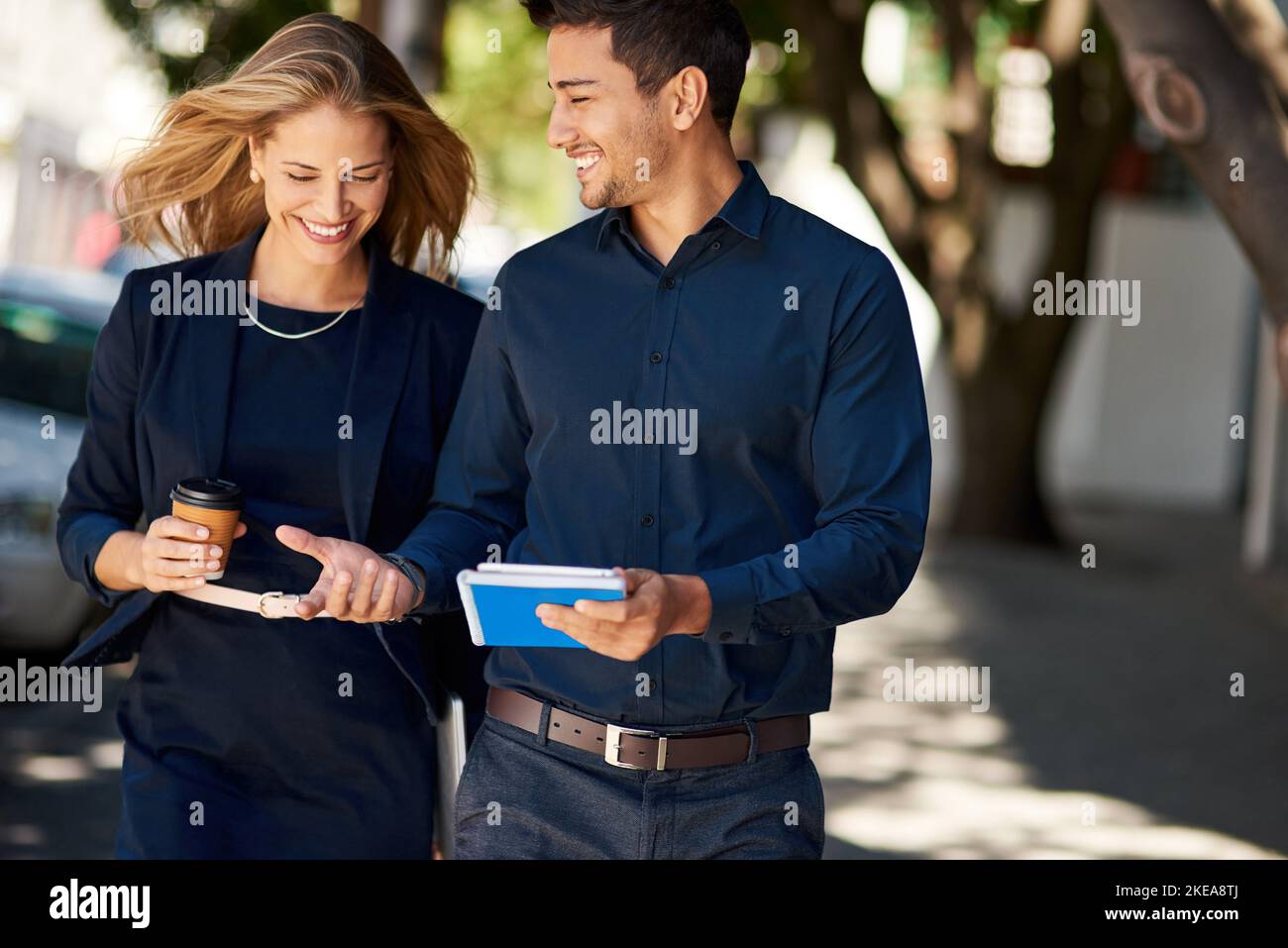 Theyre two of the best in the business. two corporate colleagues having ...