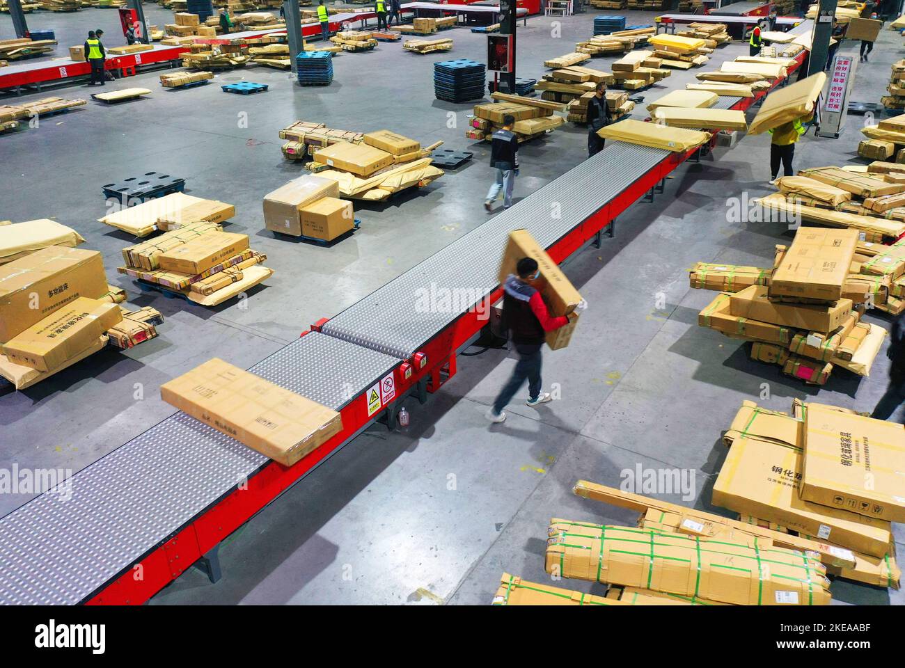 XUZHOU, CHINA - NOVEMBER 11, 2022 - Staff members at SF Express ...