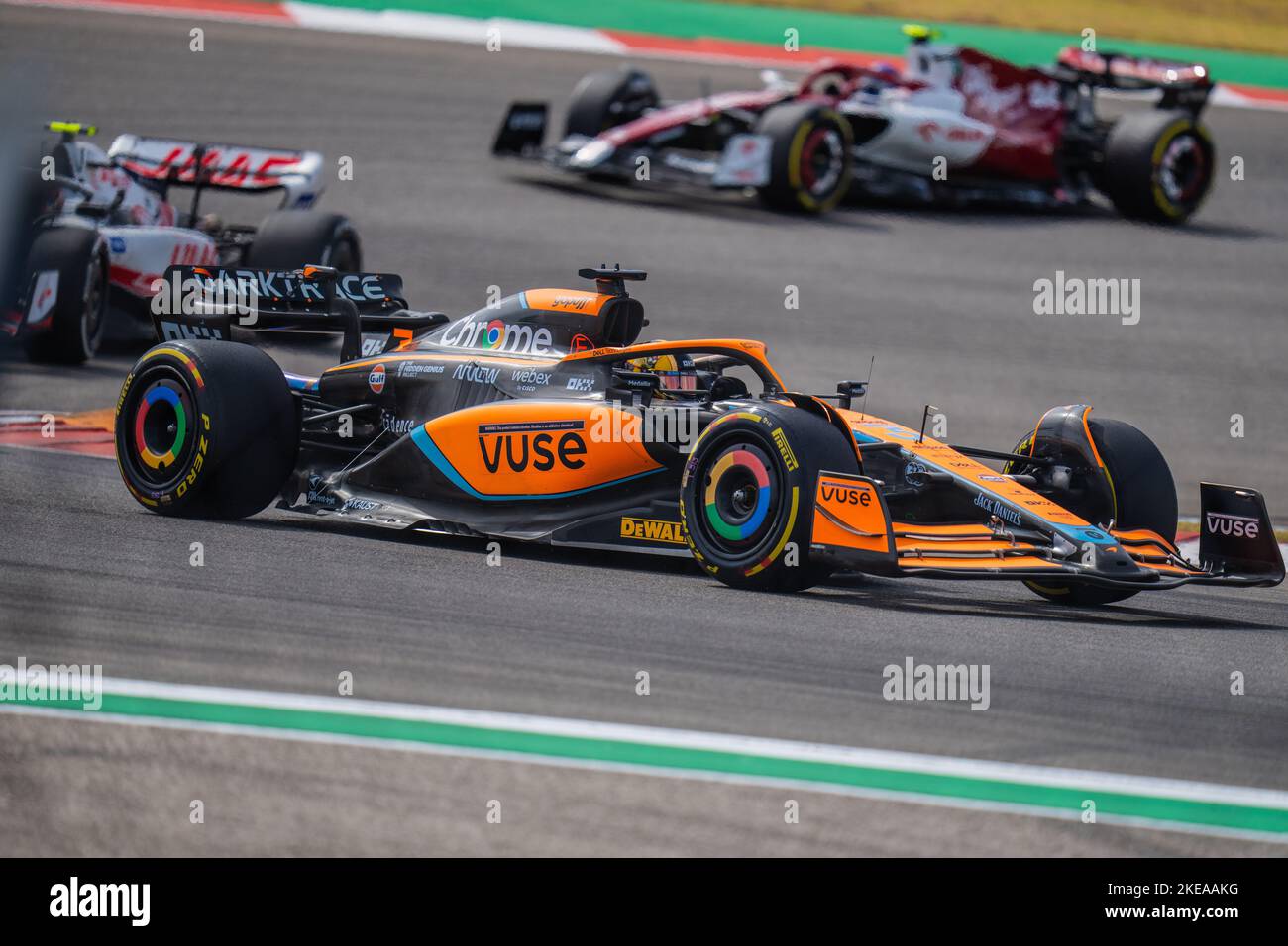 The race cars on the track during Formula 1 racing competition in ...