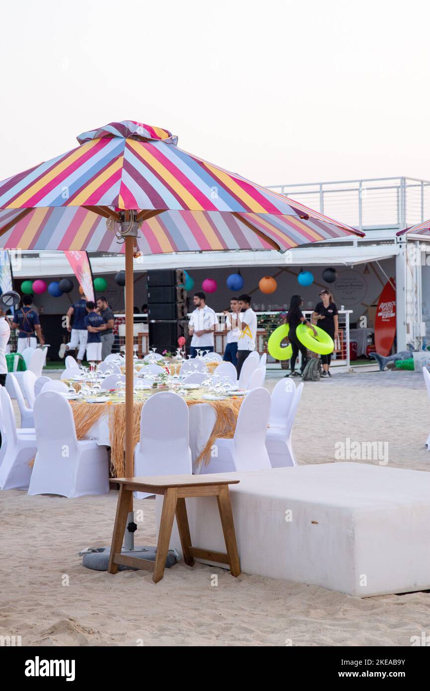 table setting at sunset outside on beach Stock Photo - Alamy