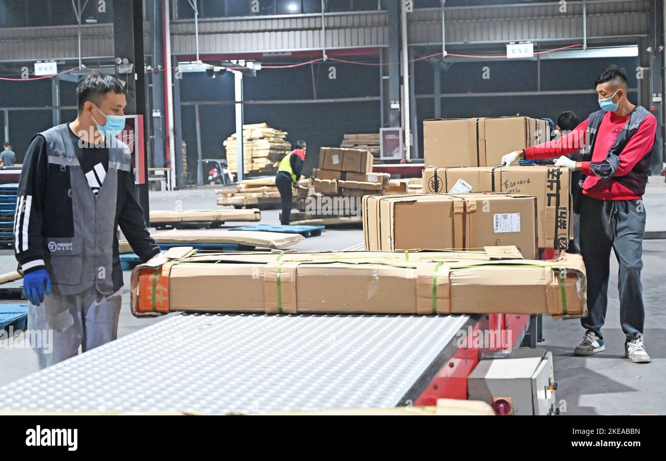 XUZHOU, CHINA - NOVEMBER 11, 2022 - Staff members at SF Express ...