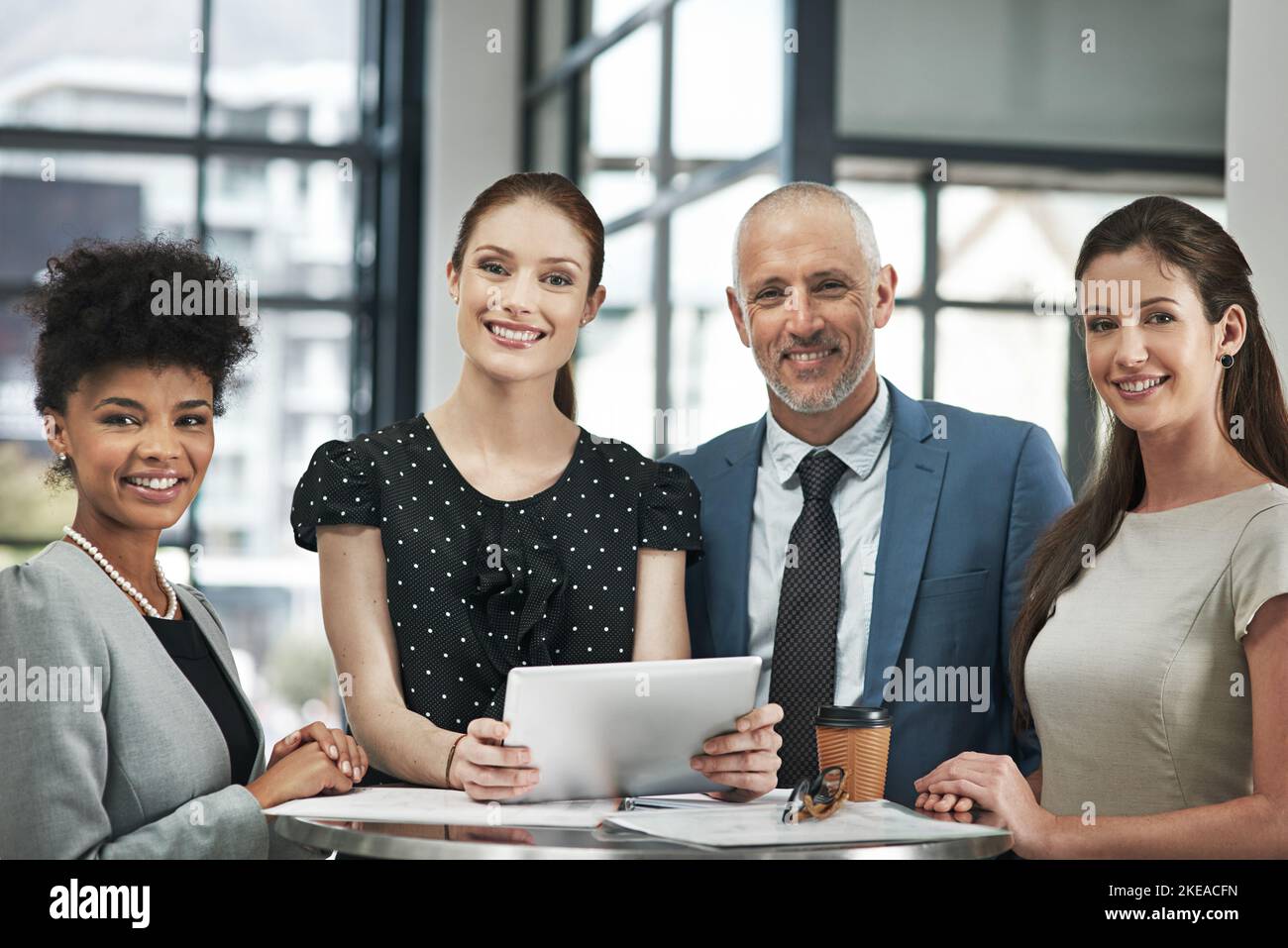 Business is all about achieving success together. Portrait of a group ...