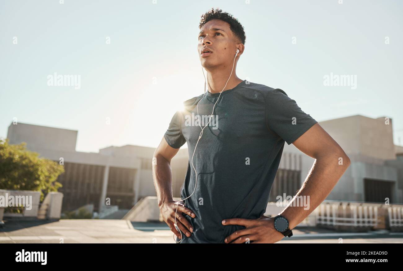 Music headphones, sunshine and fitness athlete ready for cardio ...