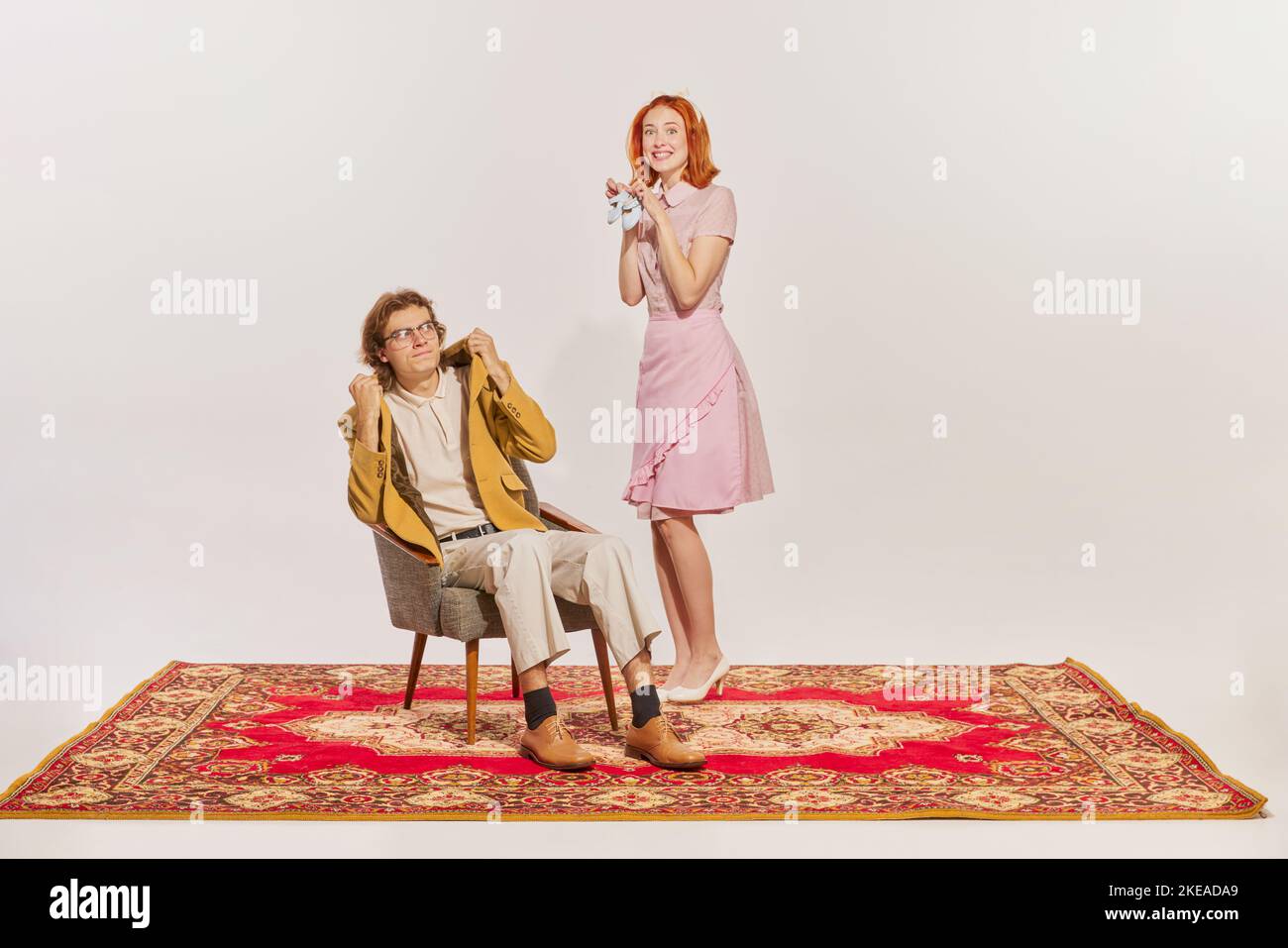 Portrait of beautiful young woman holding baby shoes meaning pregnancy ...