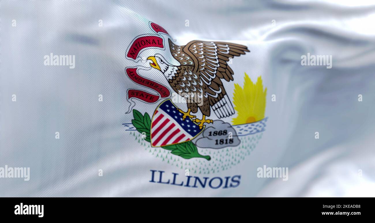 Close-up view of Illinois state flag waving in the wind. Illinois is a ...