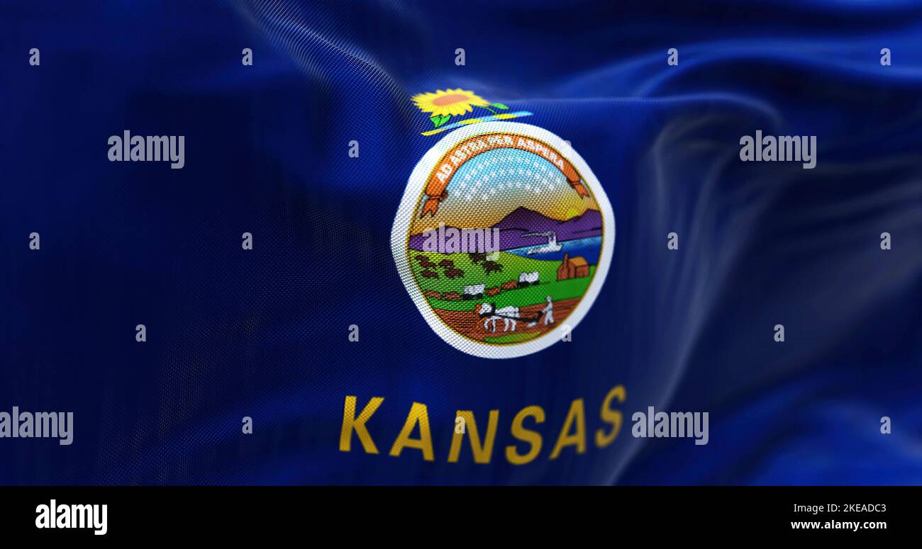 Close-up view of Kansas state flag waving in the wind. Kansas is a ... Close-up view of Kansas state flag waving in the wind. Kansas is a ...