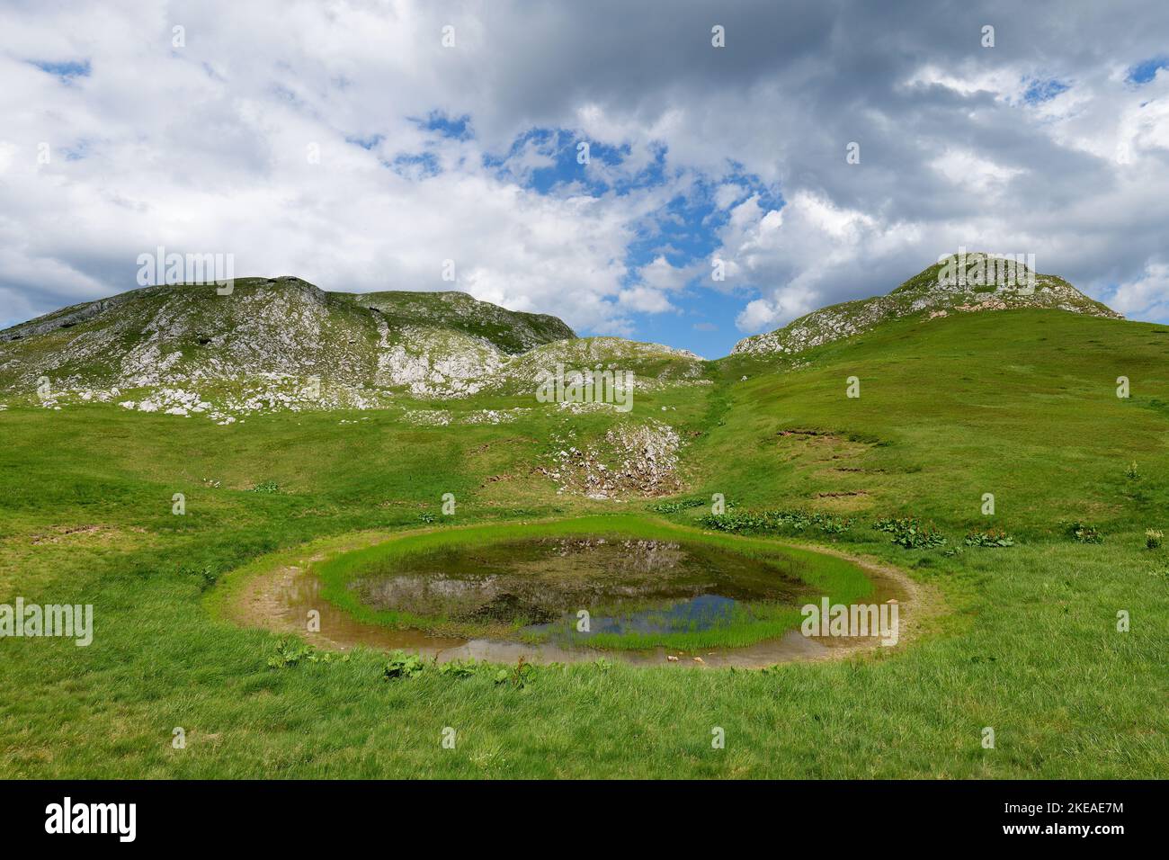 Zelengora mountains in Sutjeska National Park. Small pond in the valley ...