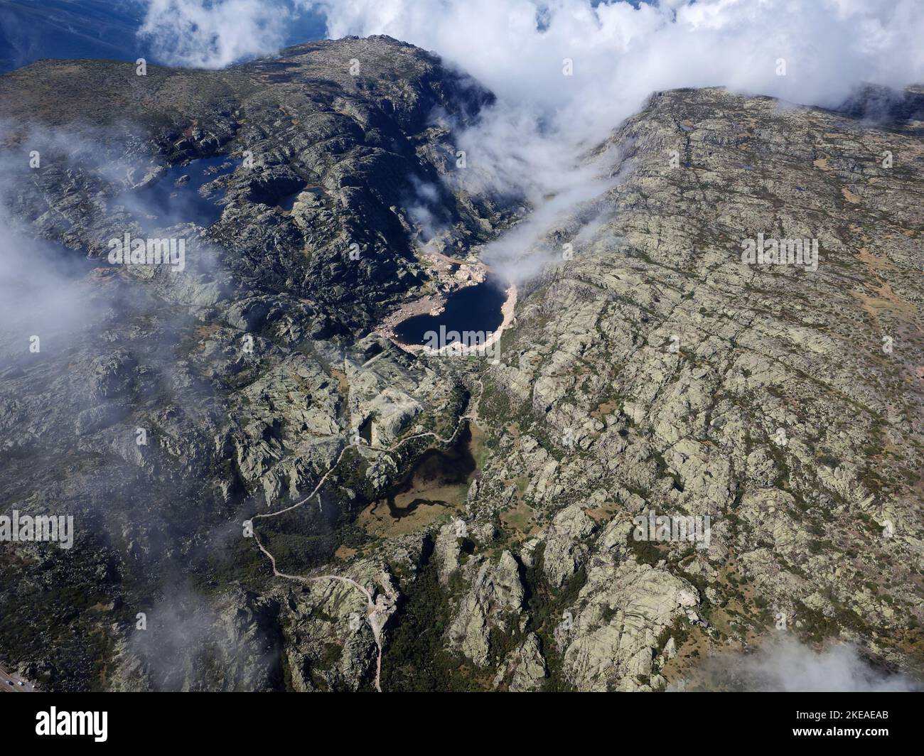 Aerial drone view of lakes in Serra da Estrela, Portugal with clouds ...