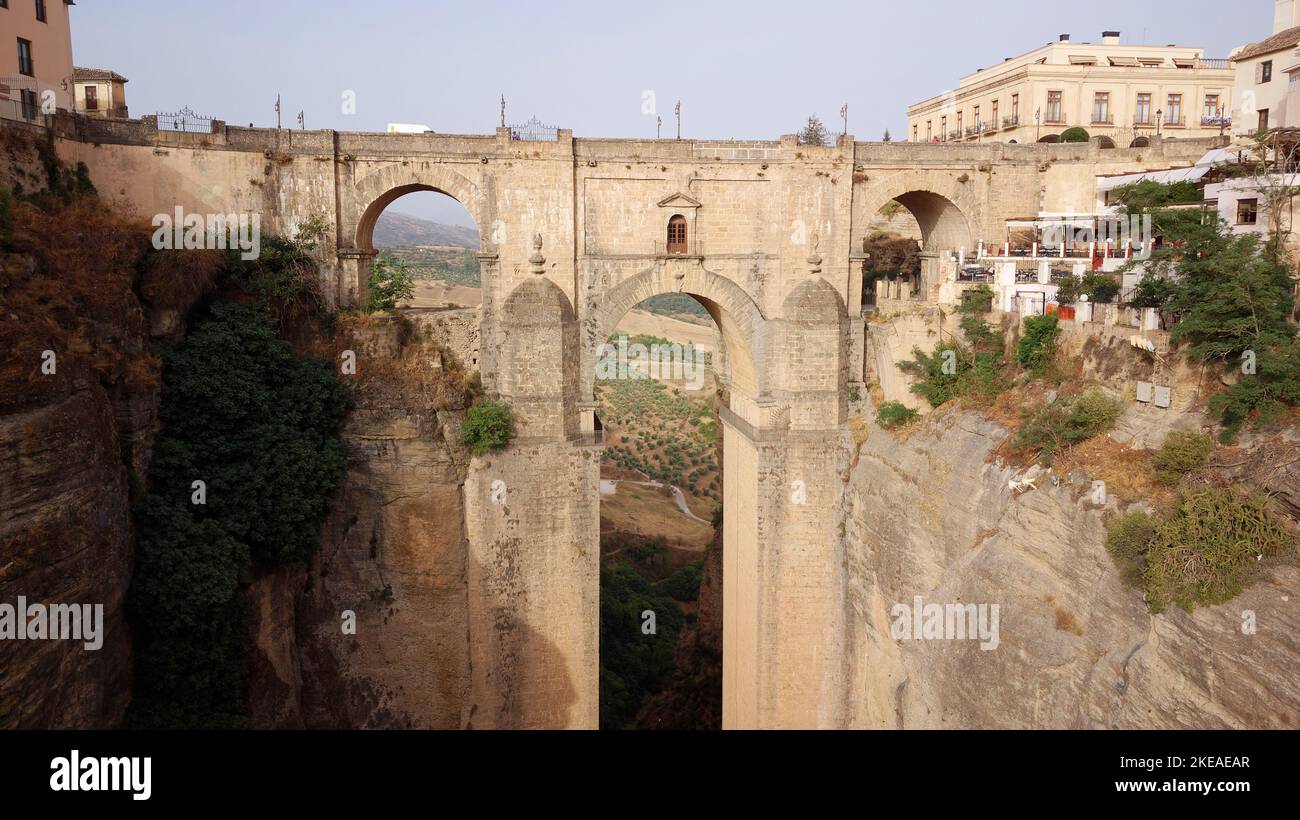 Aerial drone view of New Bridge in Ronda. White villages in the ...