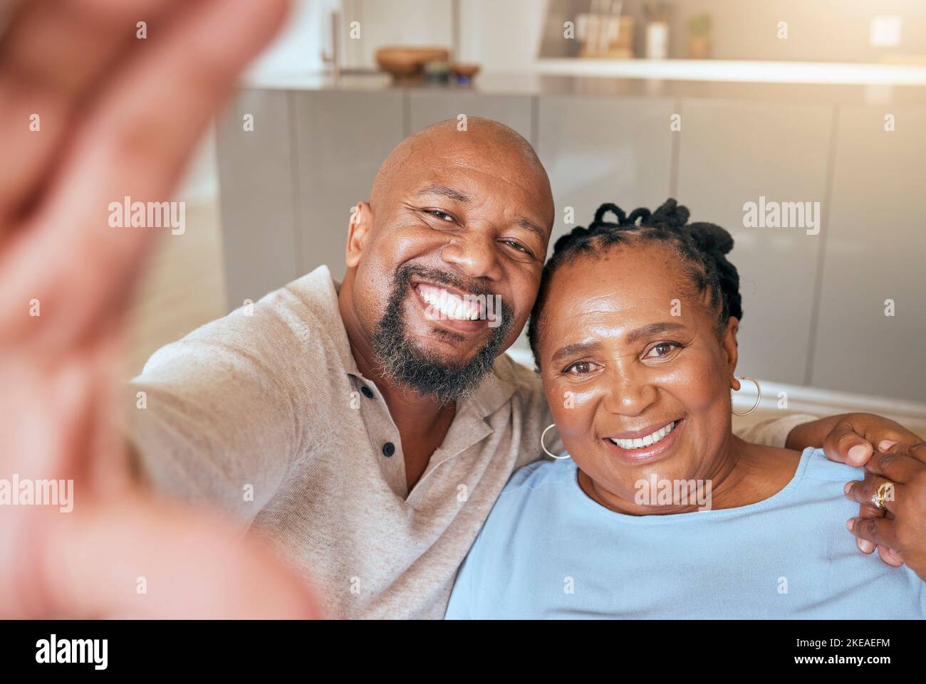 Black couple hug in selfie and relax together, happy and love at home ...